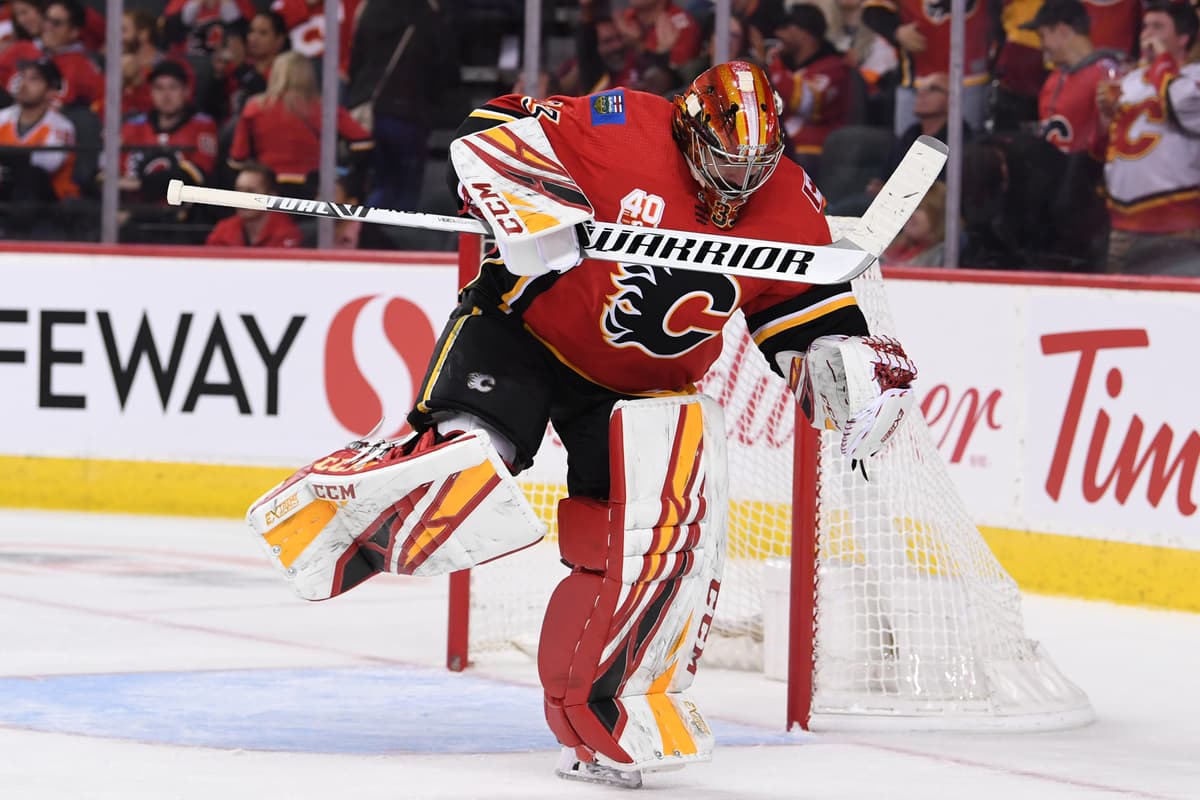 Flames win the hard way, again