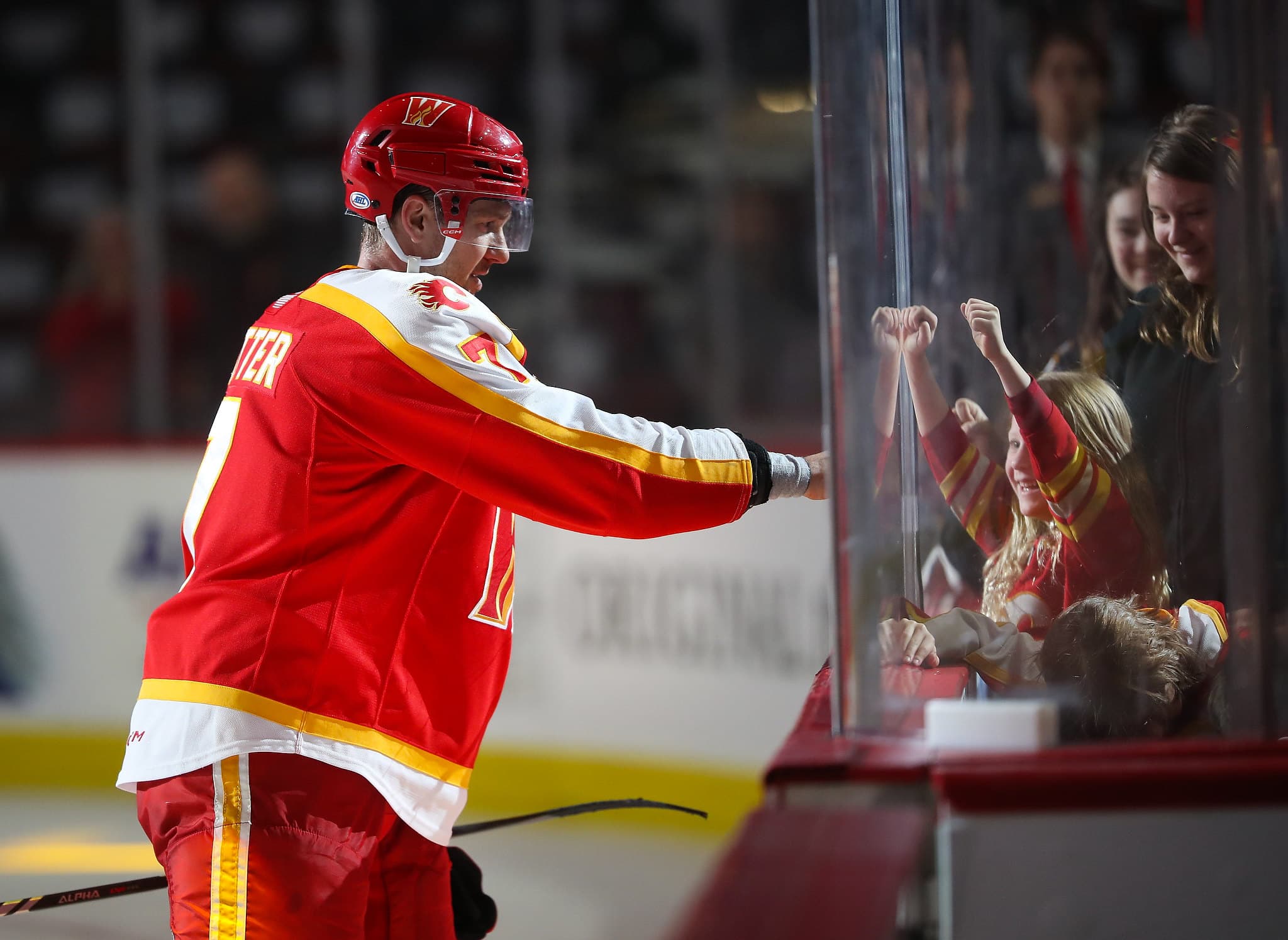 Wranglers to be led by assistant coach Brett Sutter for two weeks after ...